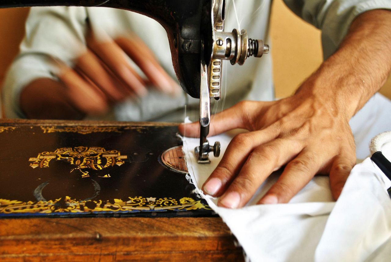 AP PHOTOS: Inside the changing world of a Pakistani tailor
