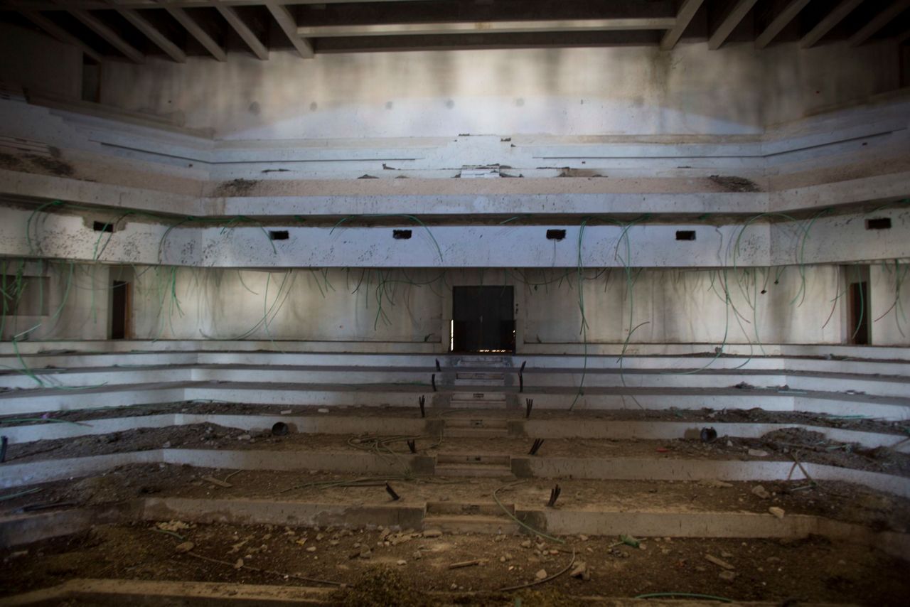 AP PHOTOS: Unfinished Palestinian parliament a grim symbol