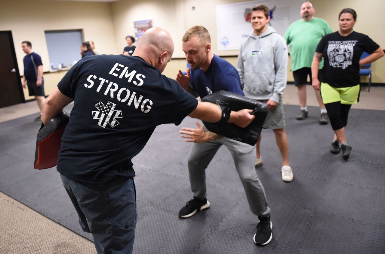 Besieged Portland, Oregon, paramedics get defense training