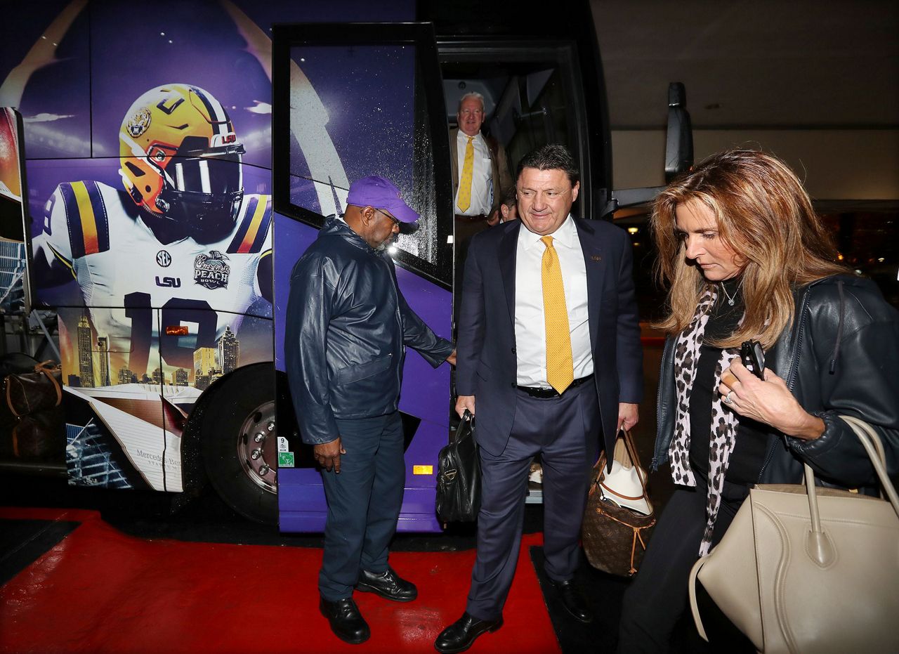 LSU's Edwards-Helaire still mending, a no-show for media day