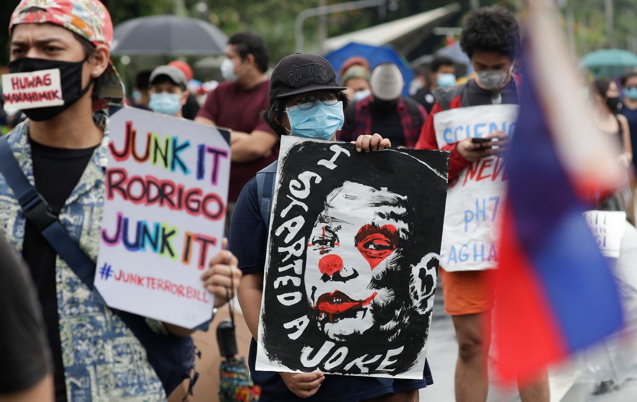 Philippine activists protest anti-terror law despite threats