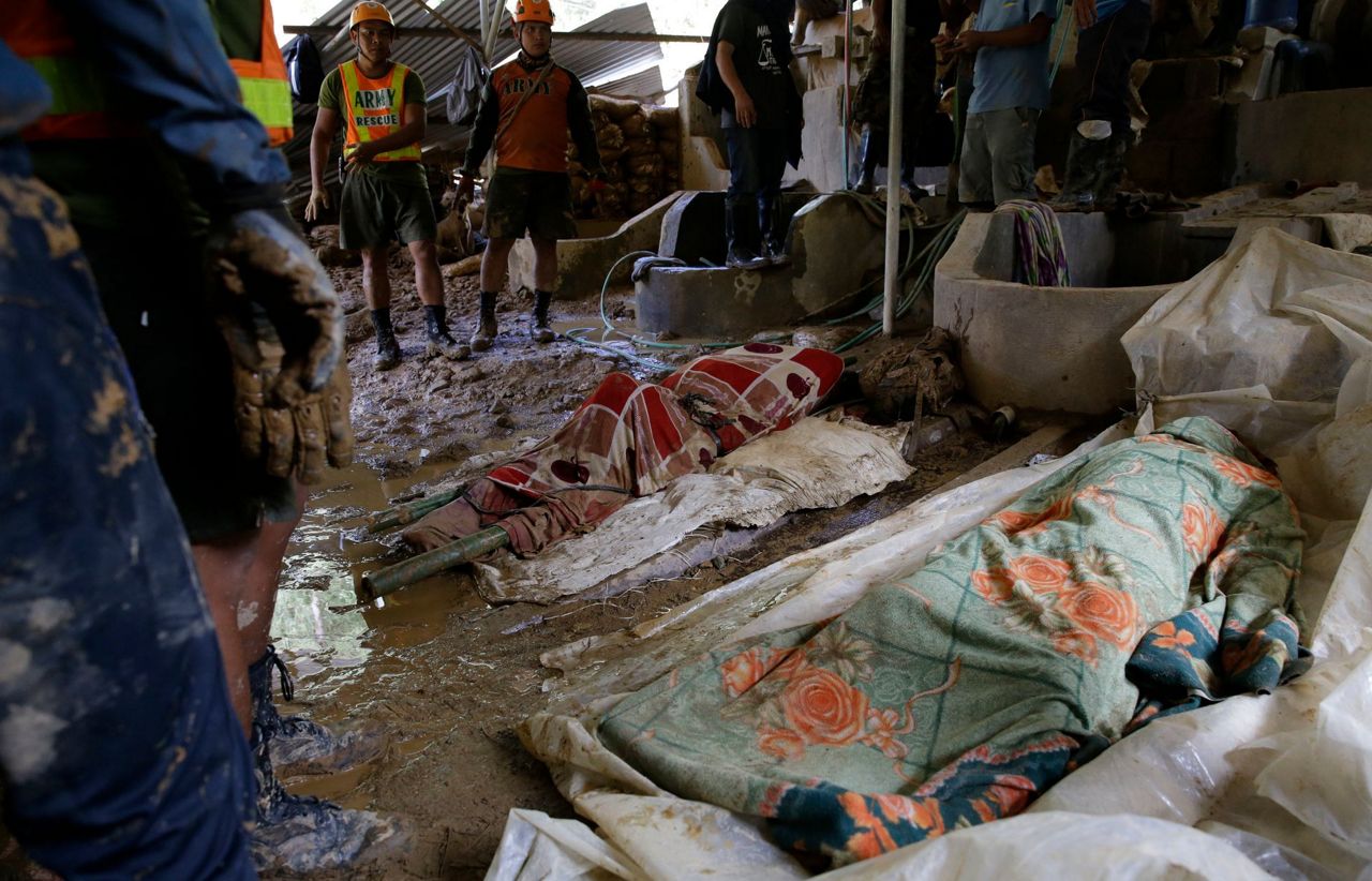 Philippines halts risky mining in mountains hit by typhoon