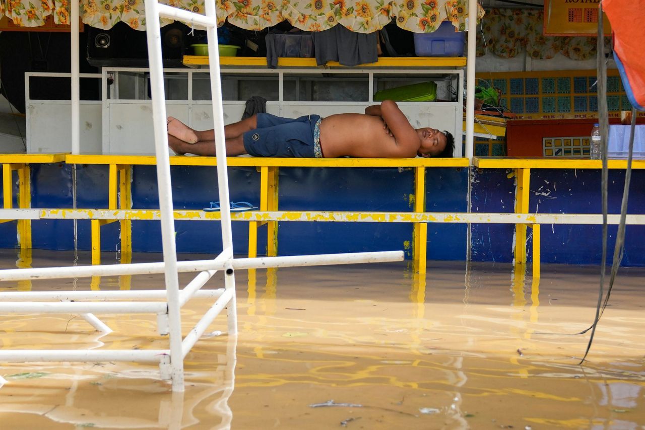 Powerful typhoon leaves 5 rescuers dead in north Philippines