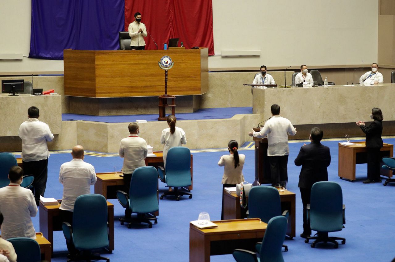 Philippine Congress standoff ends as 1 of 2 speakers quits
