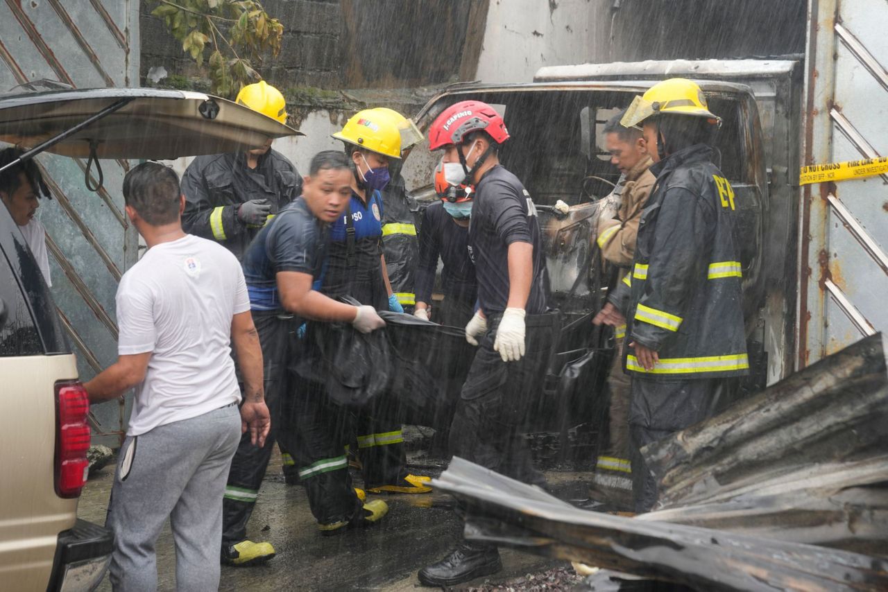 A fire kills 15 in a Philippine factory, where rains and a wrong ...