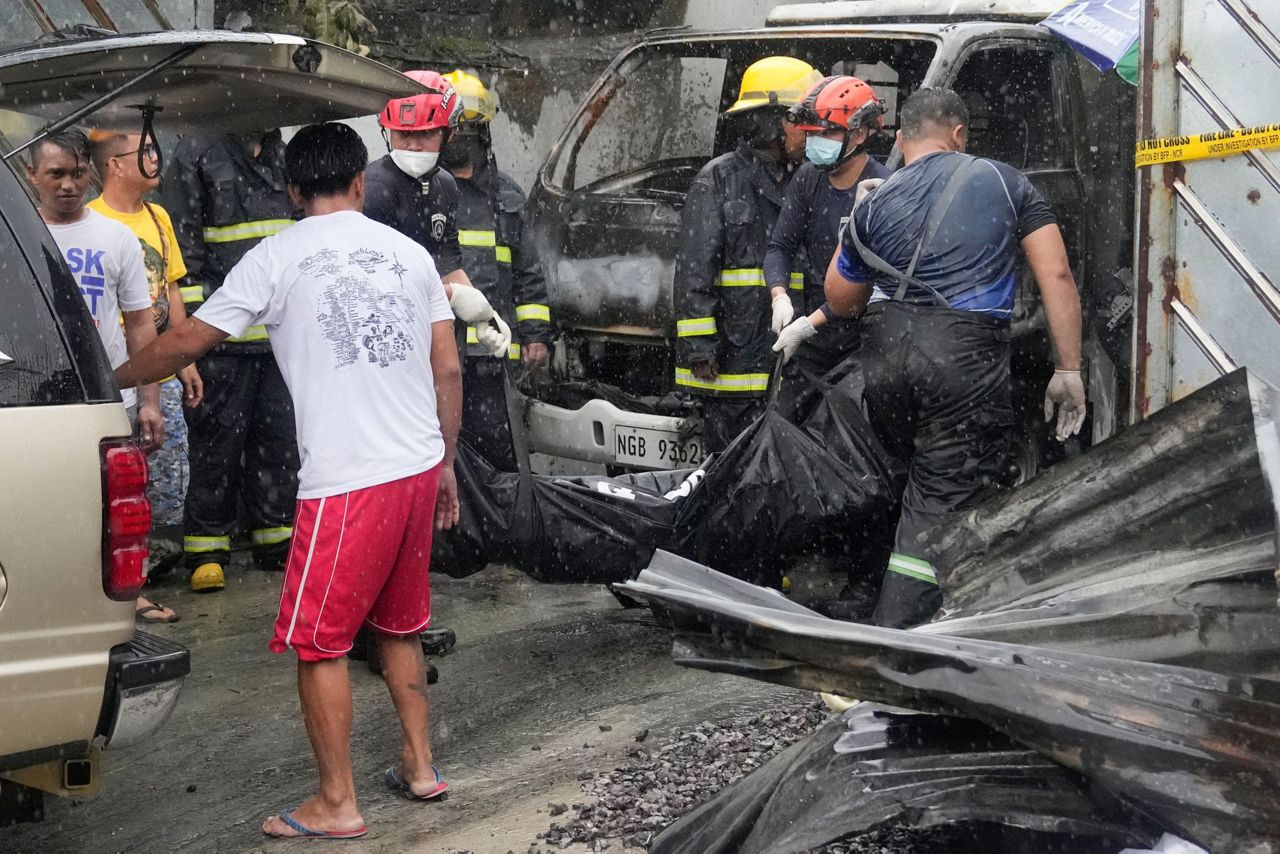 A fire kills 15 in a Philippine factory, where rains and a wrong ...