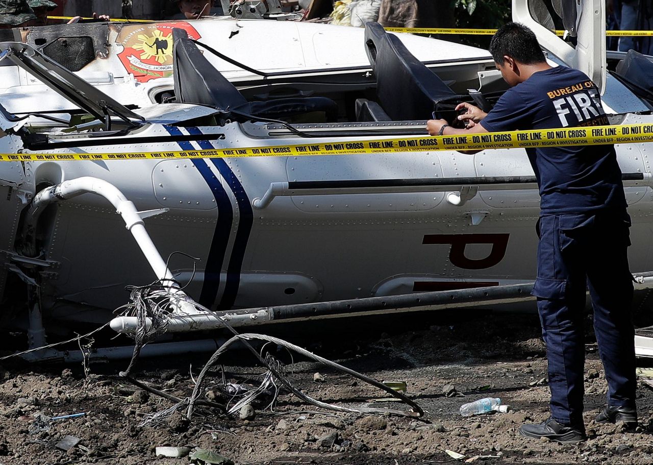 Philippine police chief, 7 others injured in chopper crash