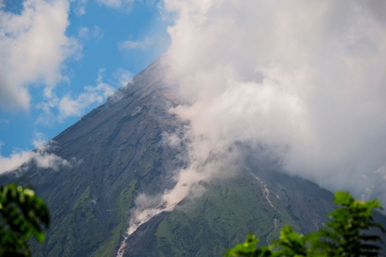 Philippines raises alert level around volcano, villagers told to leave danger zone