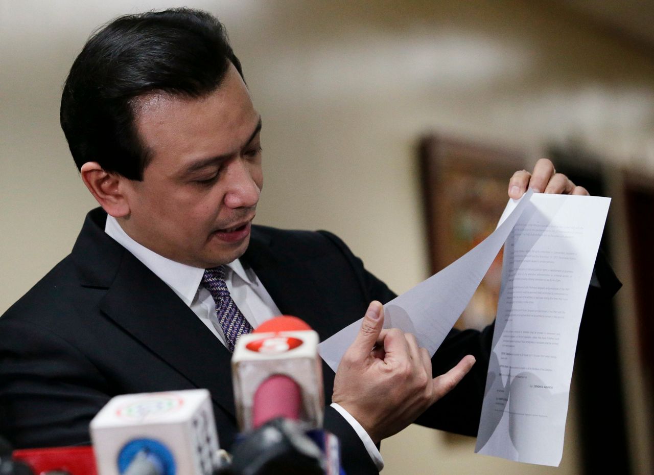 Philippine president vents anger toward fierce critic on TV