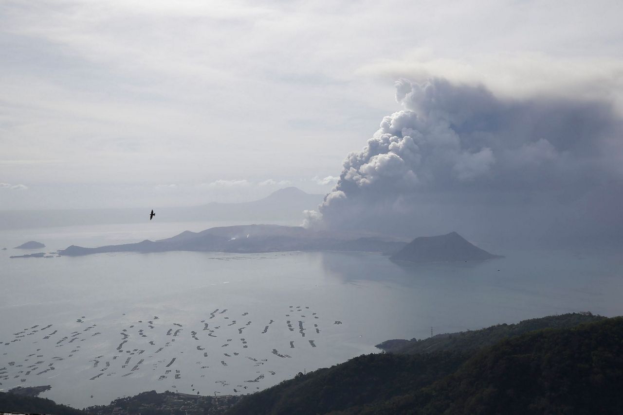 Lava gushes from Philippine volcano as ash spreads to Manila