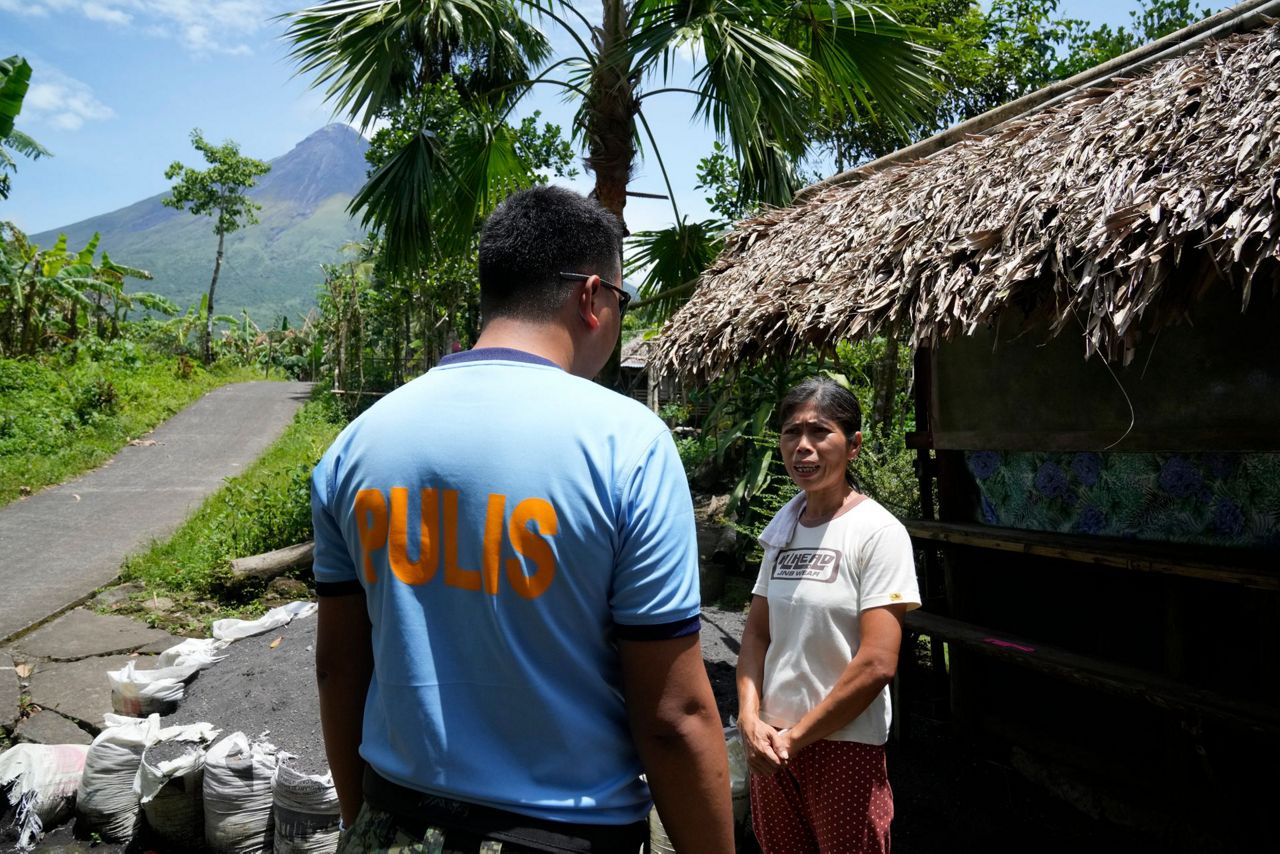 Students meet under trees as schools shelter villagers displaced by ...