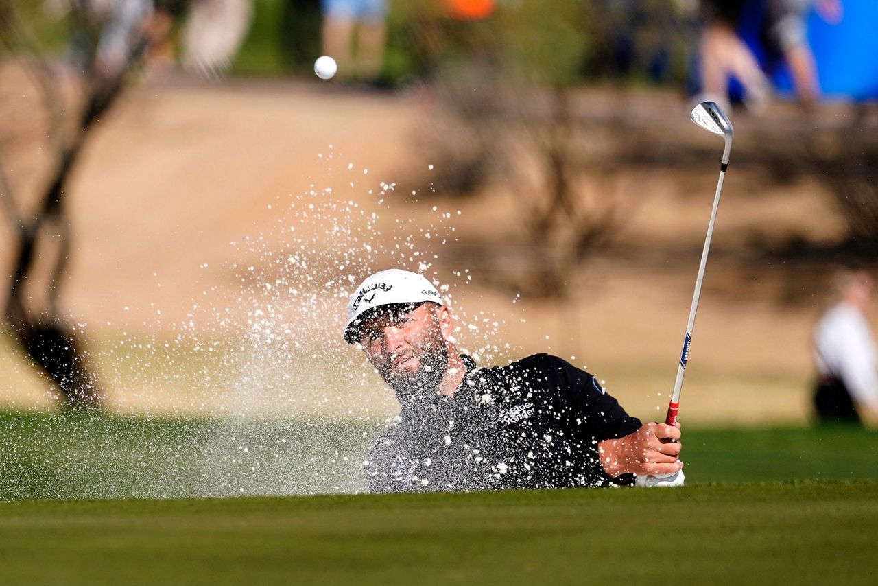 Defending champion Scottie Scheffler leads WM Phoenix Open