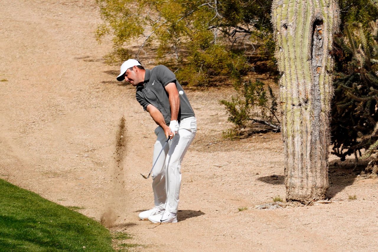 Scheffler holds WM Phoenix Open lead in bid to repeat