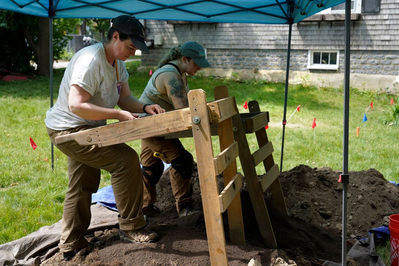 Archaeologists dig hilltop over Plymouth Rock one last time