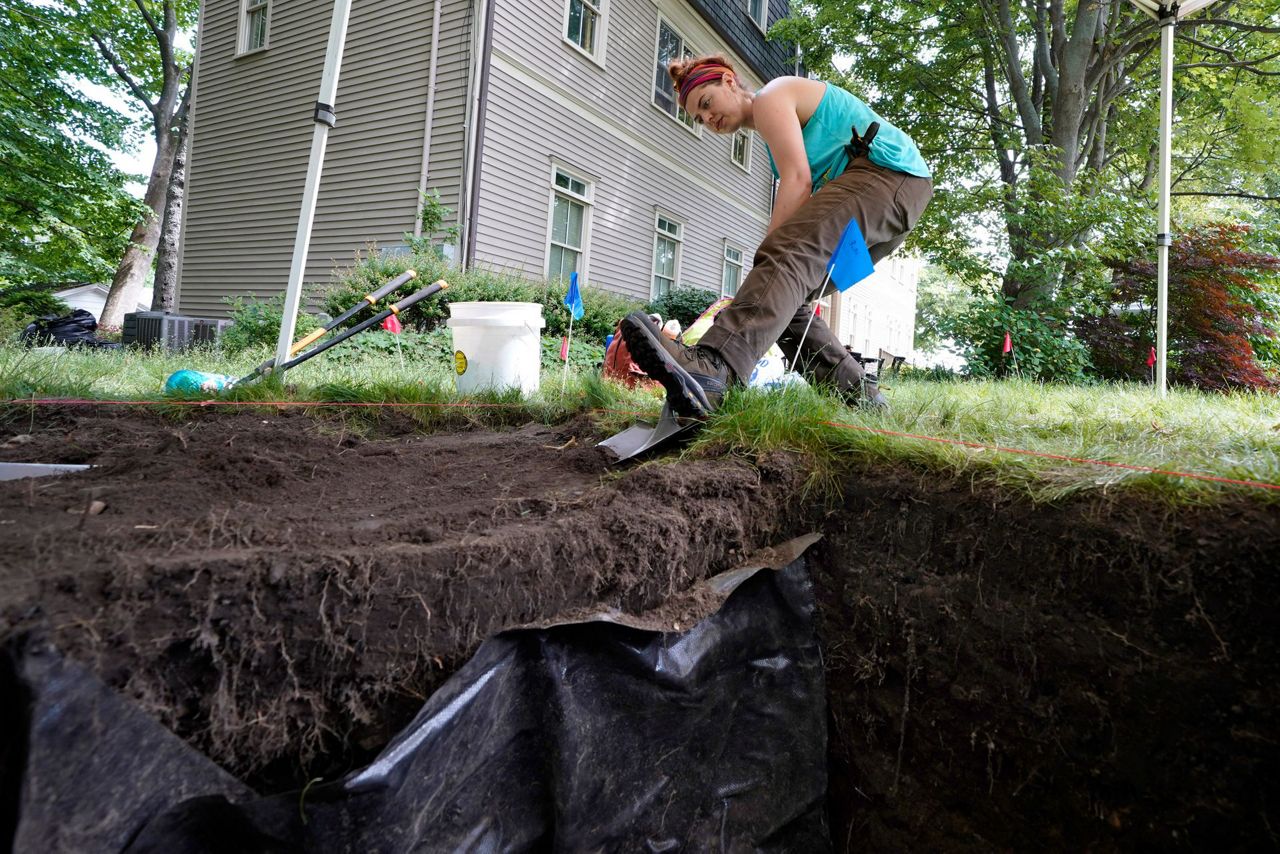 Archaeologists dig hilltop over Plymouth Rock one last time