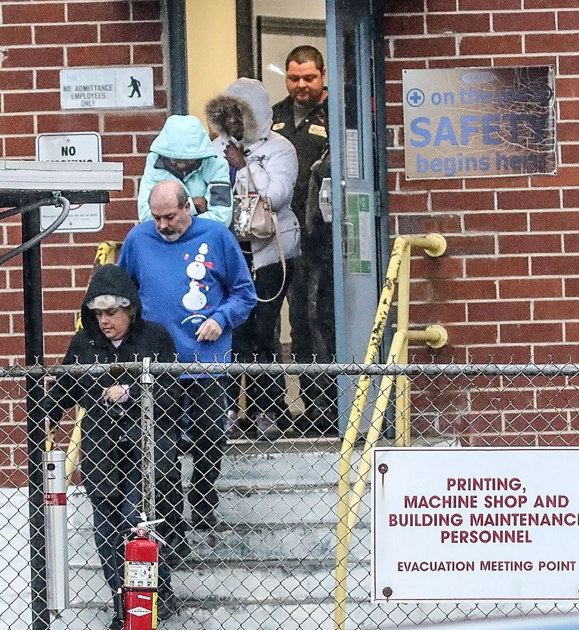 1 shot at container plant outside Atlanta; suspect sought