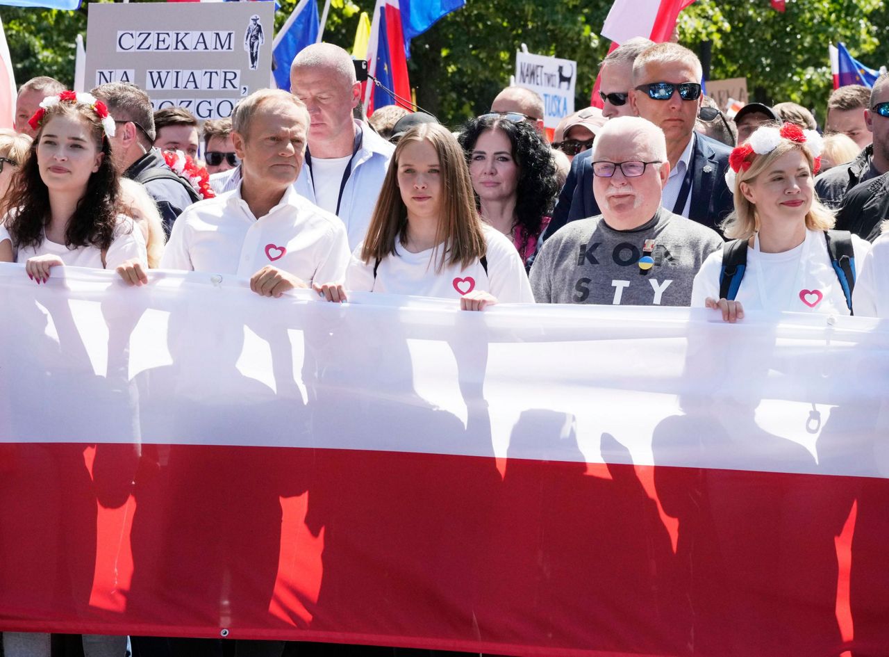 Opposition leads anti-government march on anniversary of Poland's ...