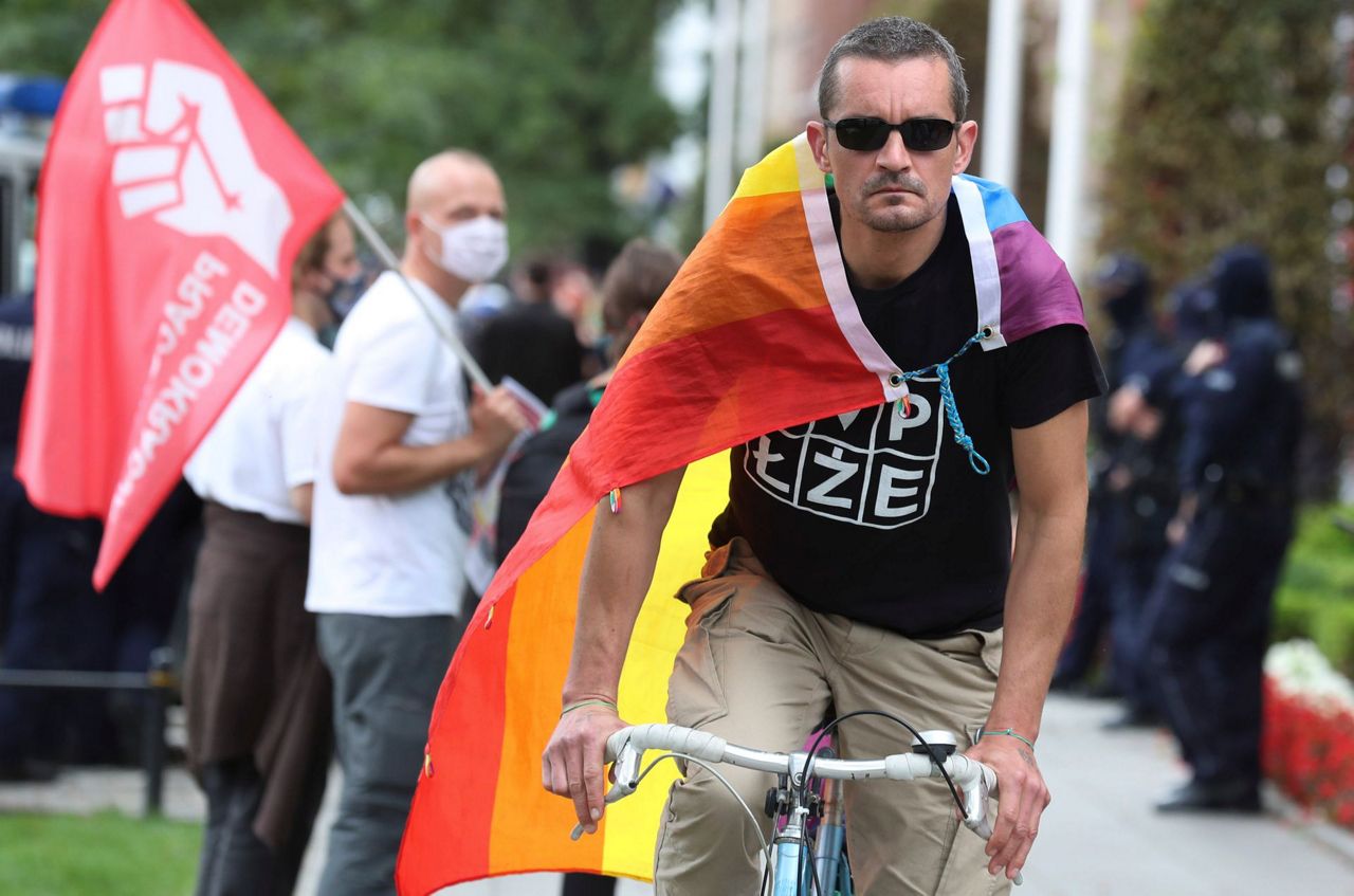 Under fire over LGBT rights, Polish leader blames activist