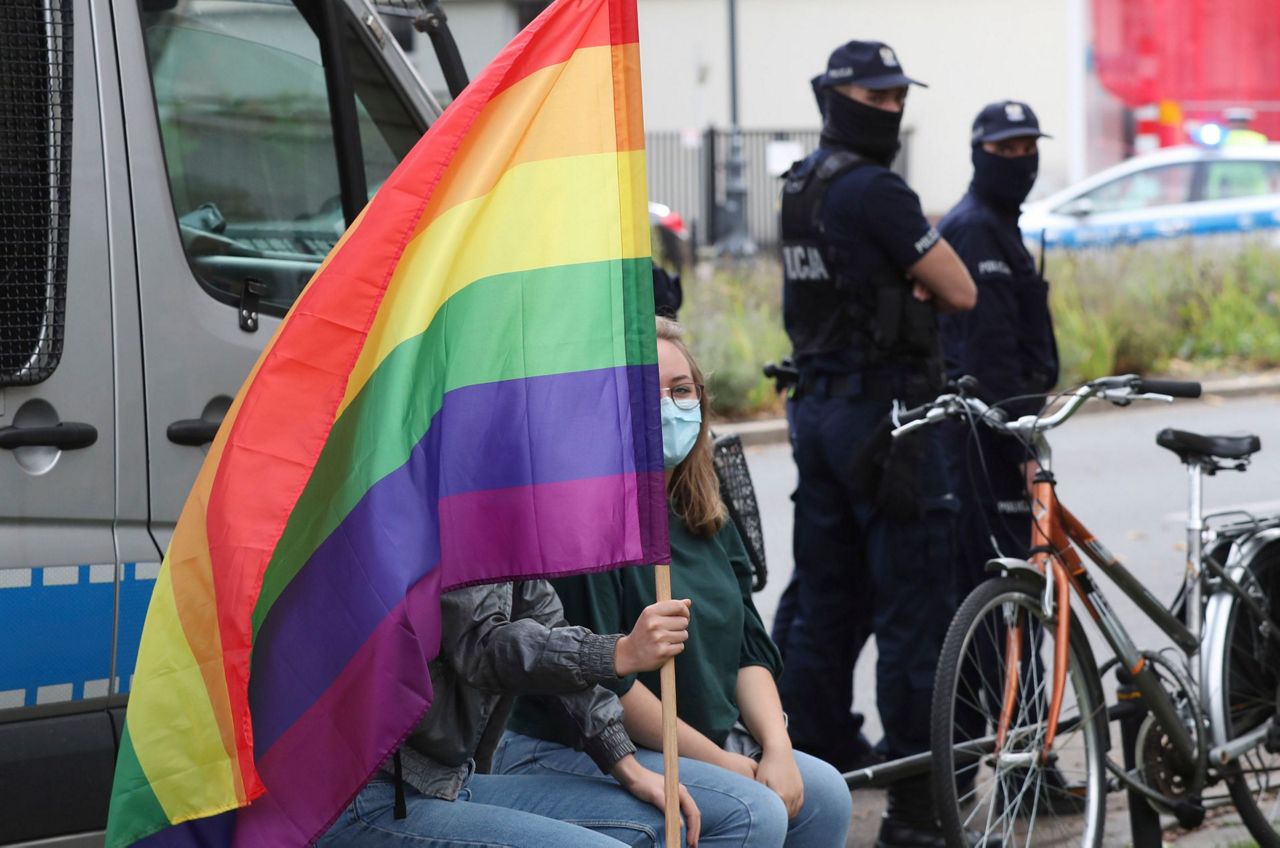 Under fire over LGBT rights, Polish leader blames activist