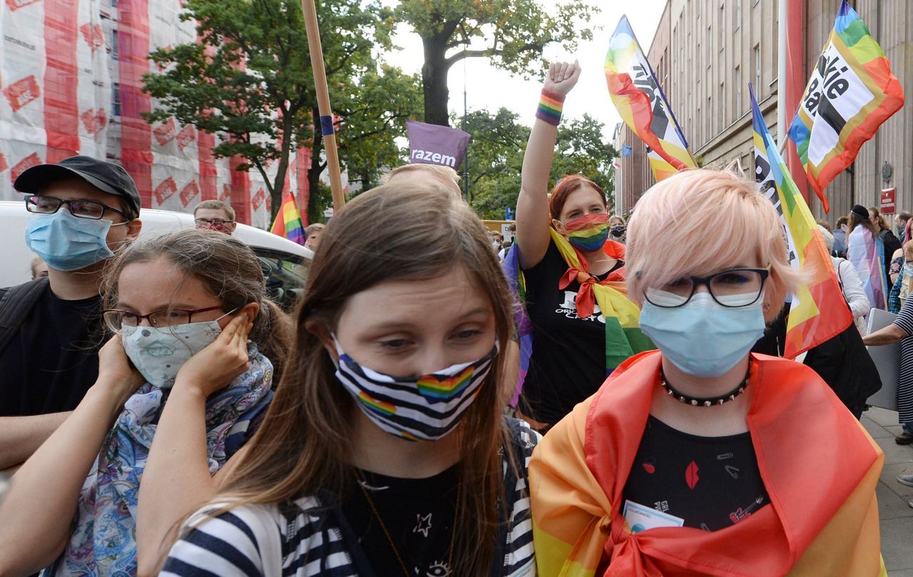 Under fire over LGBT rights, Polish leader blames activist