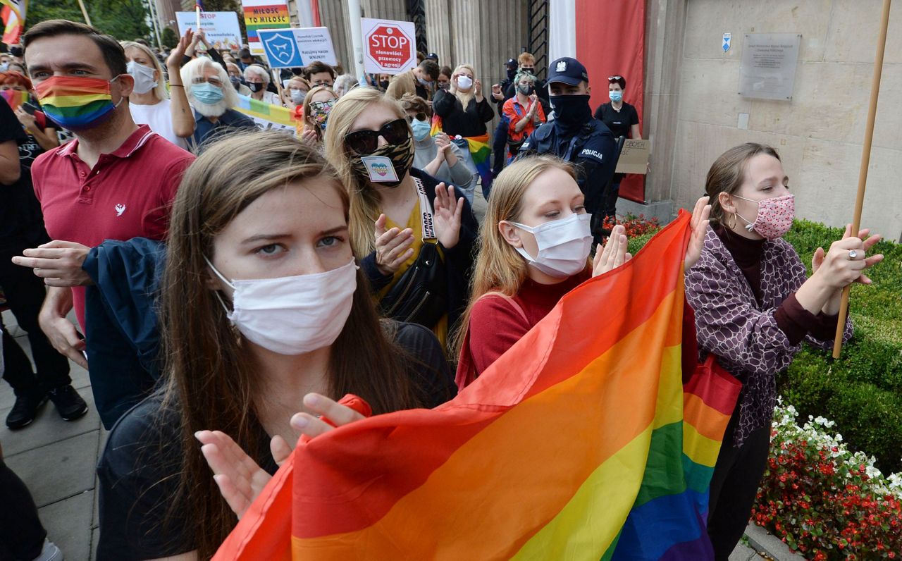 Under fire over LGBT rights, Polish leader blames activist