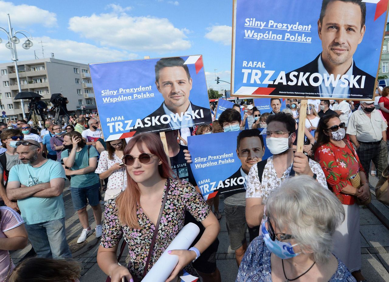 A deeply divided Poland chooses a president in runoff vote