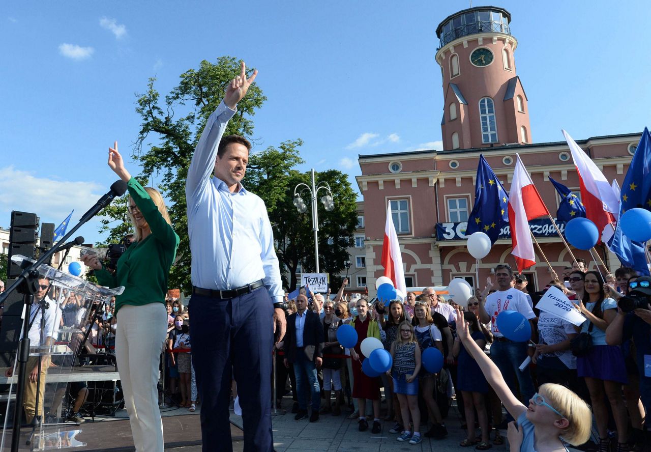 A deeply divided Poland chooses a president in runoff vote