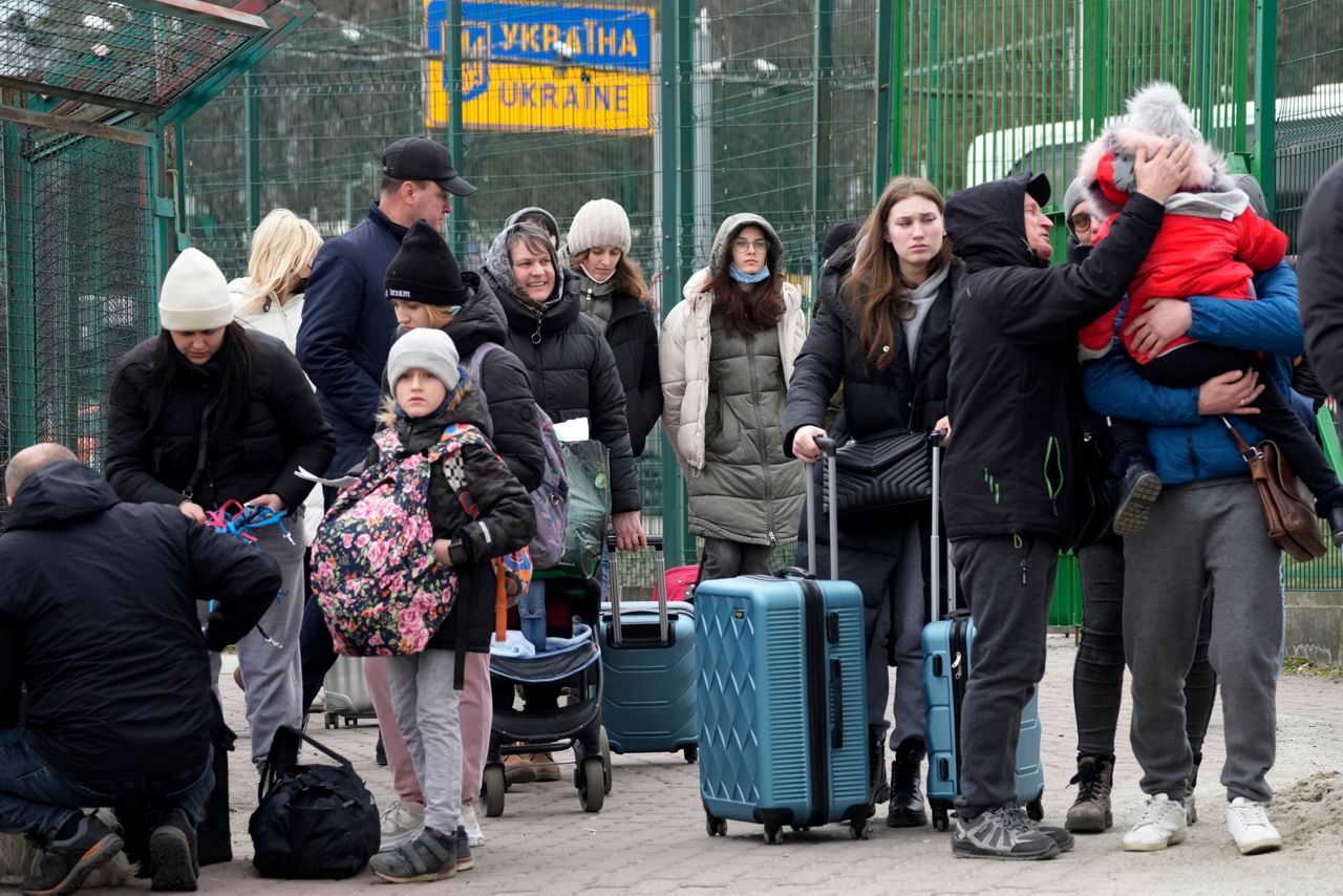 Ukrainians flee war, seeking safety across western borders