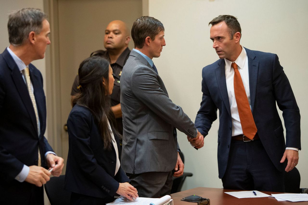 Ex-Michigan cop to face murder trial in killing of Black man