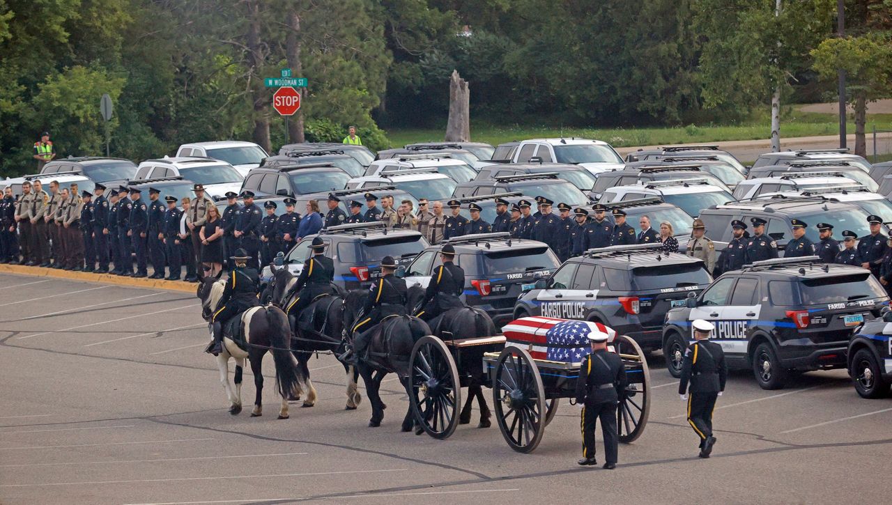 North Dakota officer killed in Fargo ambush is to be laid to rest ...