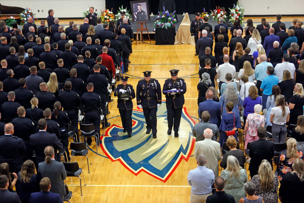 North Dakota officer killed in Fargo ambush is to be laid to rest ...