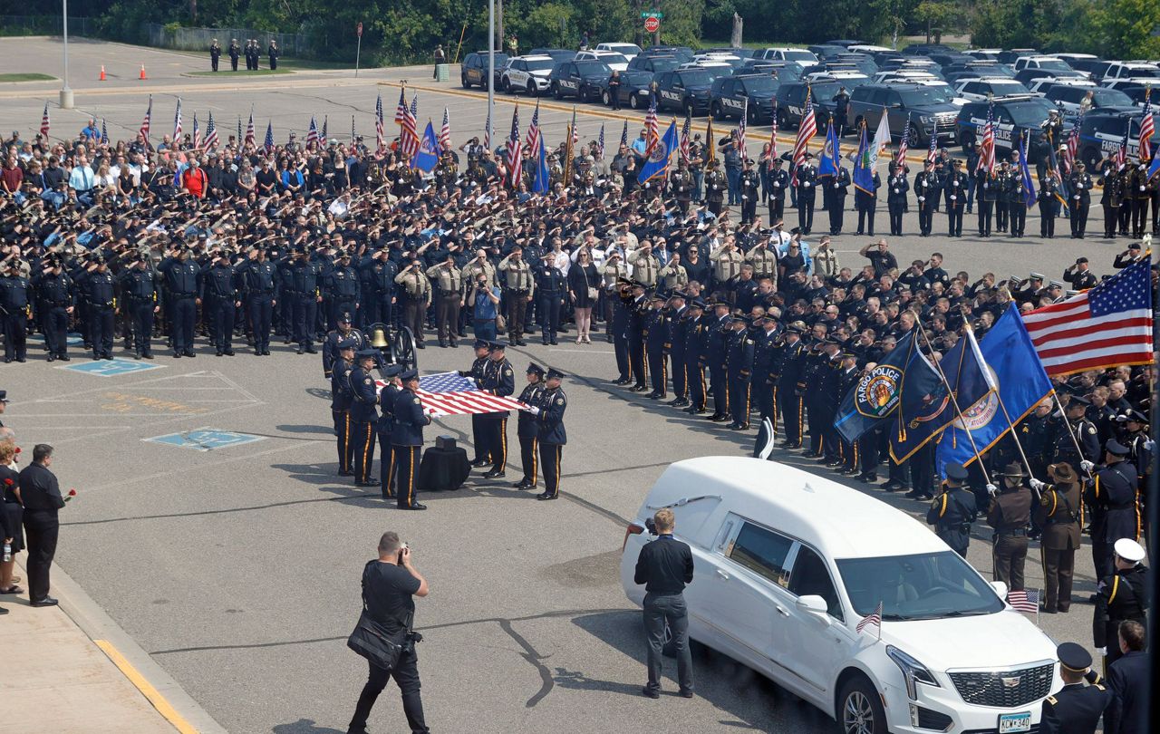 North Dakota officer killed in Fargo ambush is to be laid to rest ...