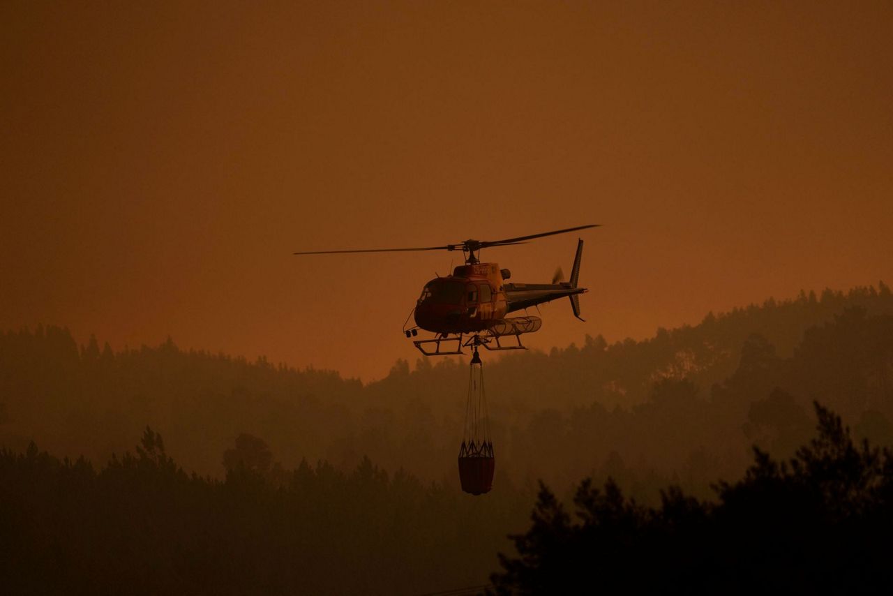 Firefighters battle wildfires from Portugal to France