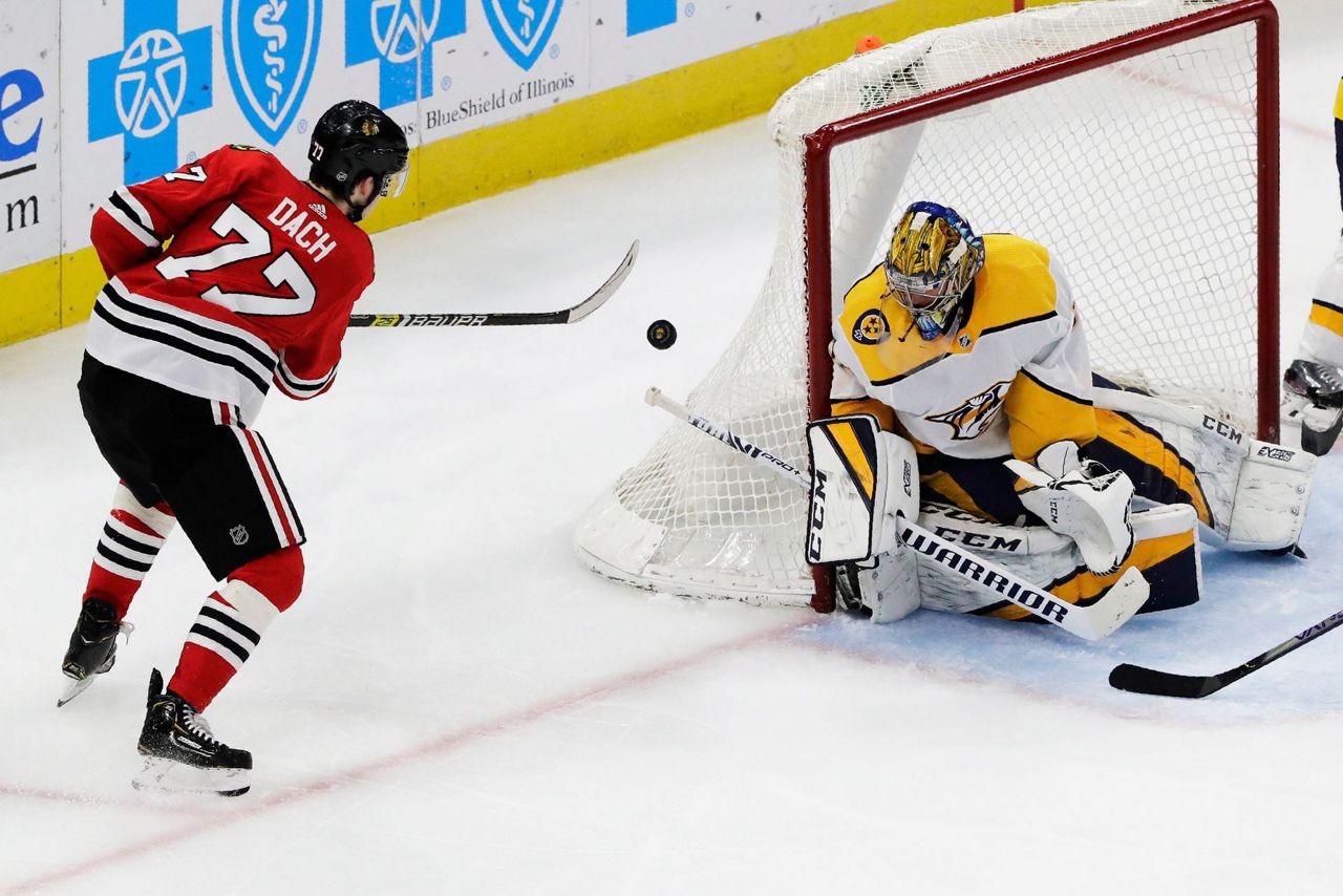 Predators beat Blackhawks 5-2 for Hynes' 1st win with team