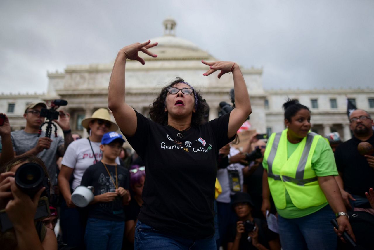 Puerto Ricans protest in anger over unused emergency aid