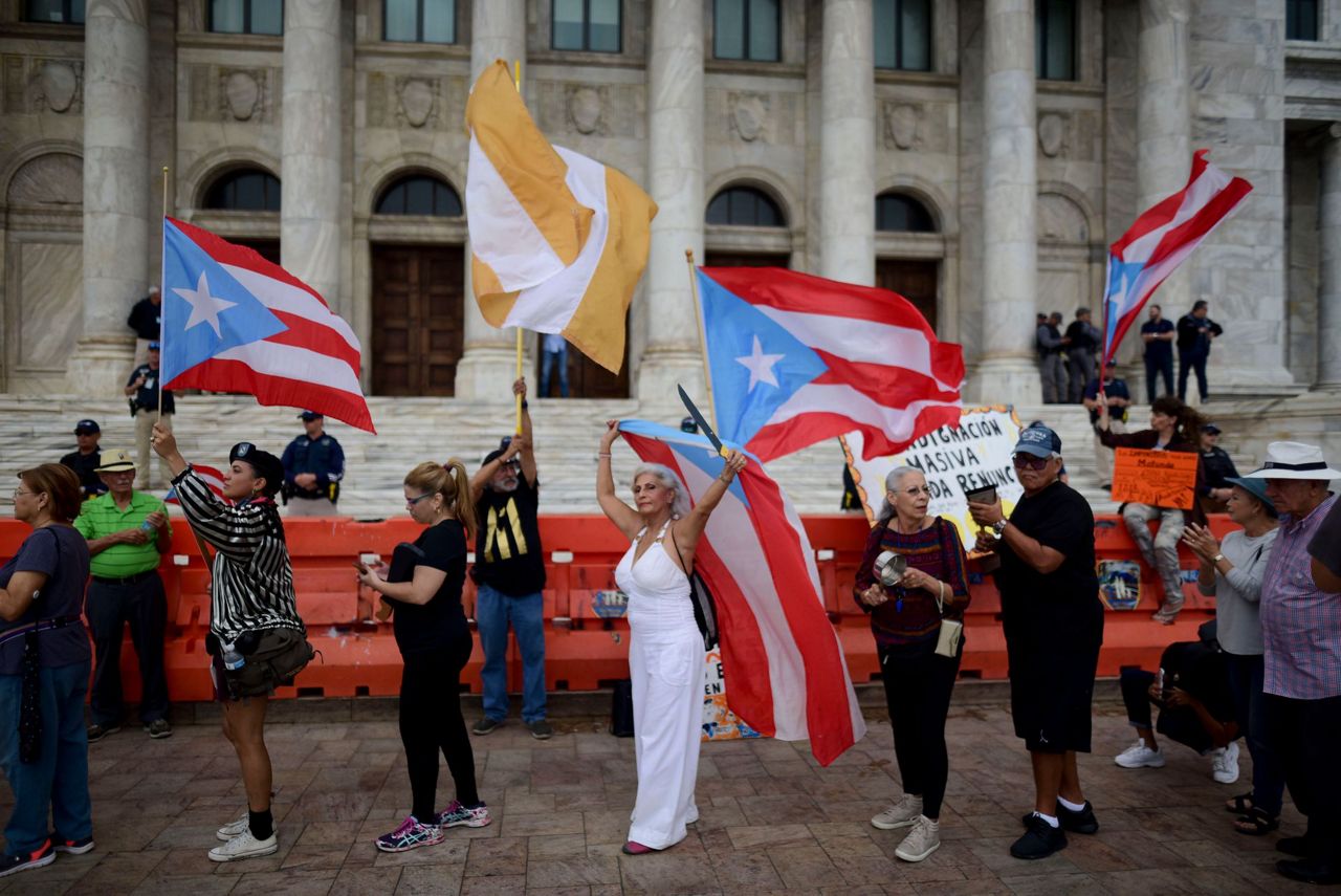 Puerto Ricans protest in anger over unused emergency aid