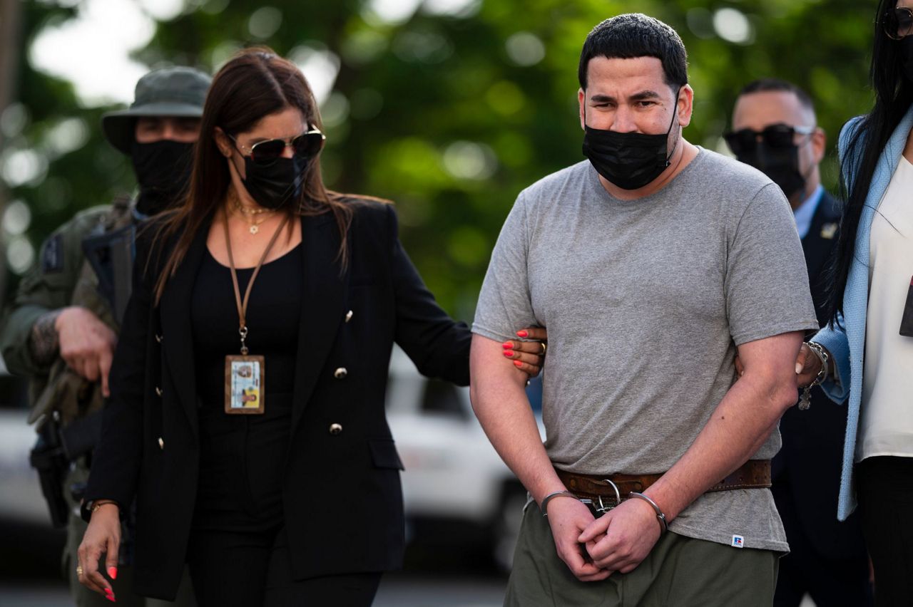 5 accused a decade after renowned Puerto Rican boxer killed