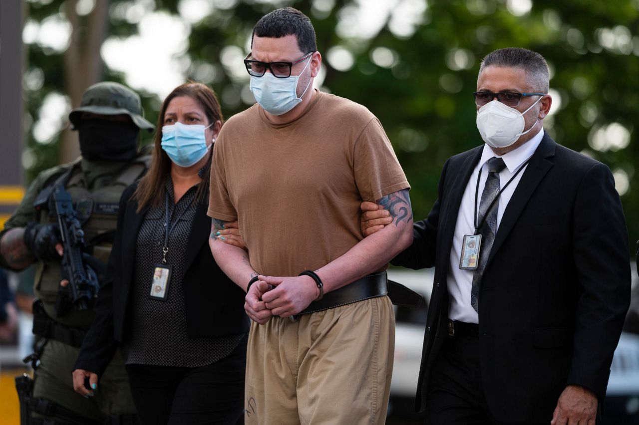 5 accused a decade after renowned Puerto Rican boxer killed