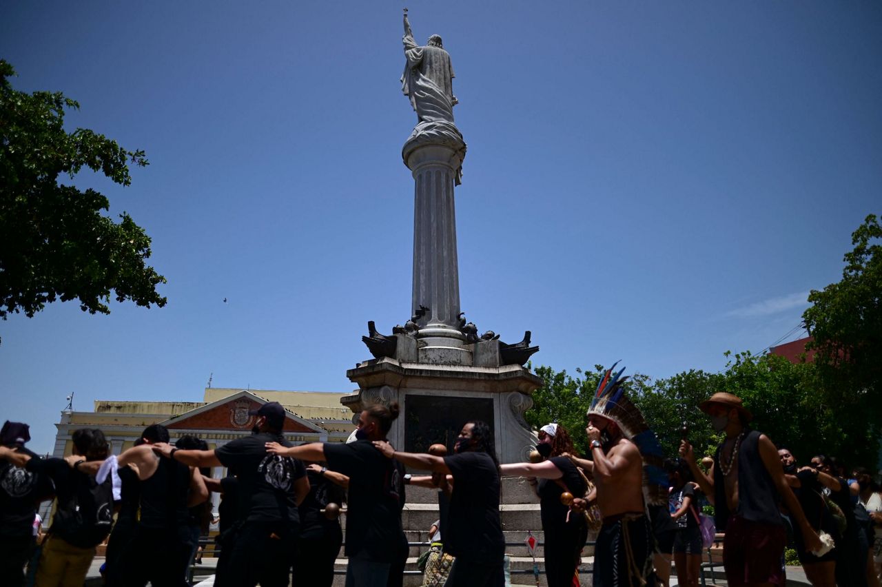 Puerto Rico questions Spain's legacy as statues tumble in US