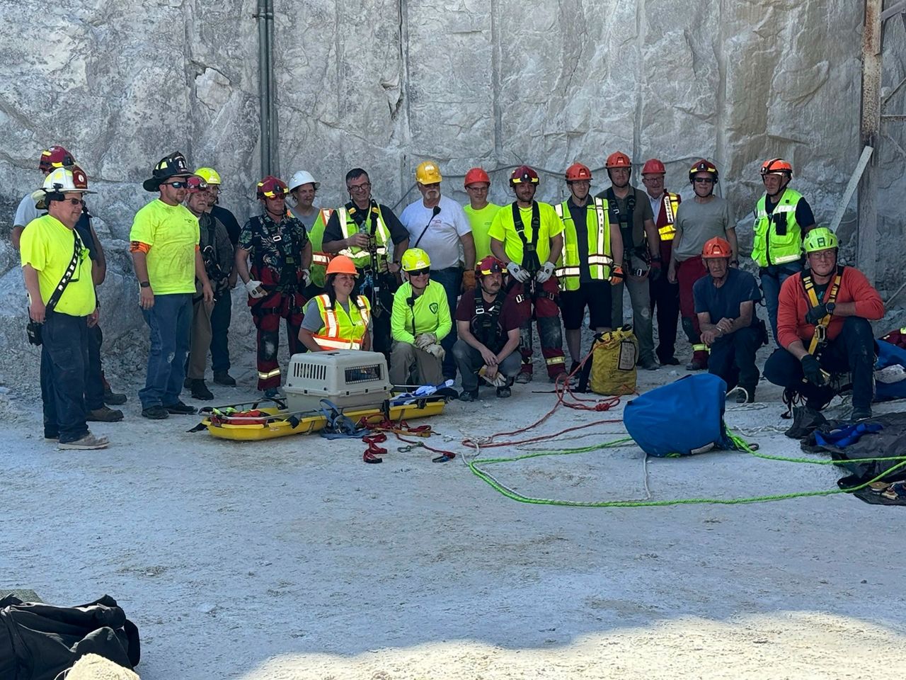 Rope team rappels down into a rock quarry to rescue a mutt named Rippy