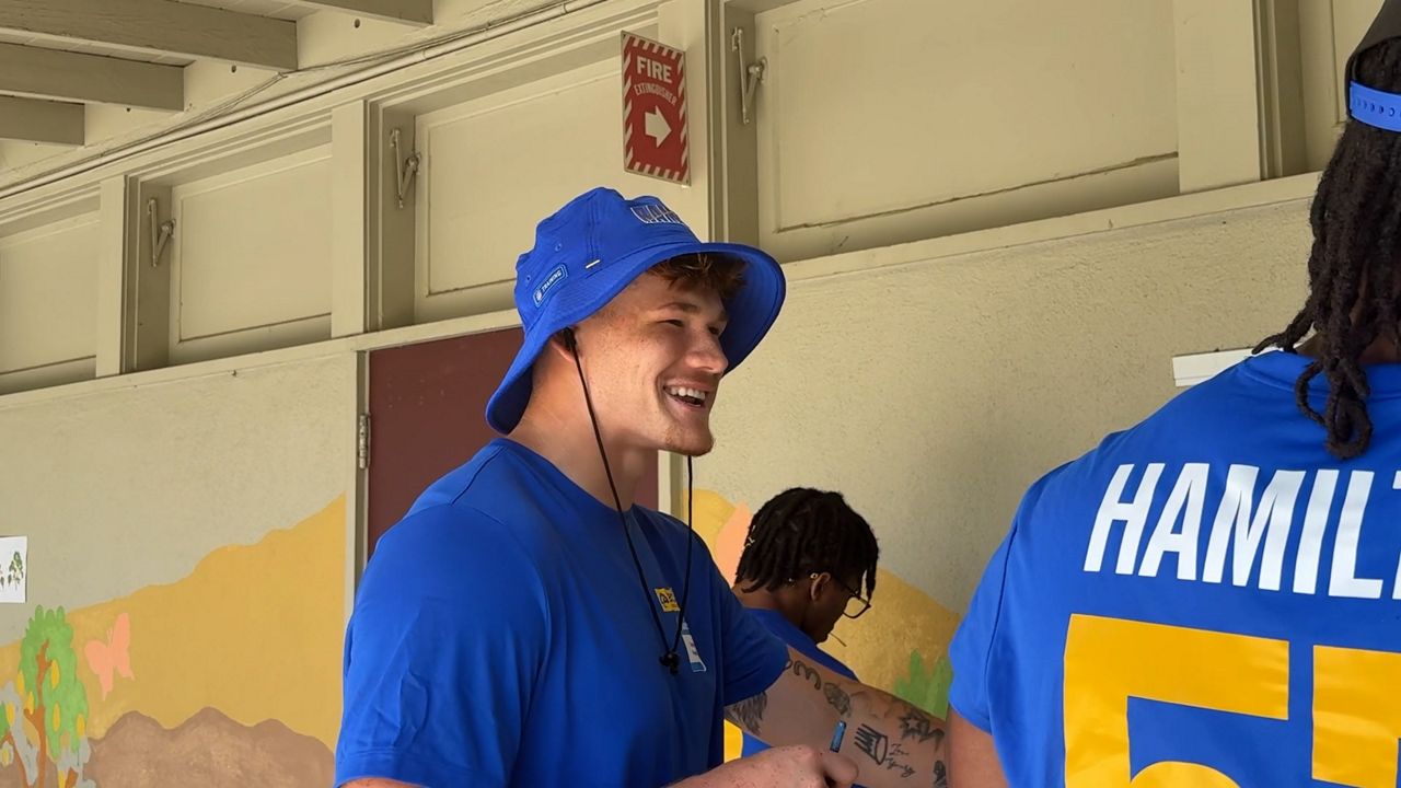 Rams rookies help Altadena school before starting season