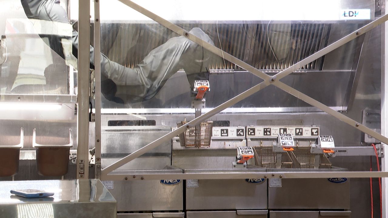 Robots cook up meals in autonomous, AI-powered restaurant