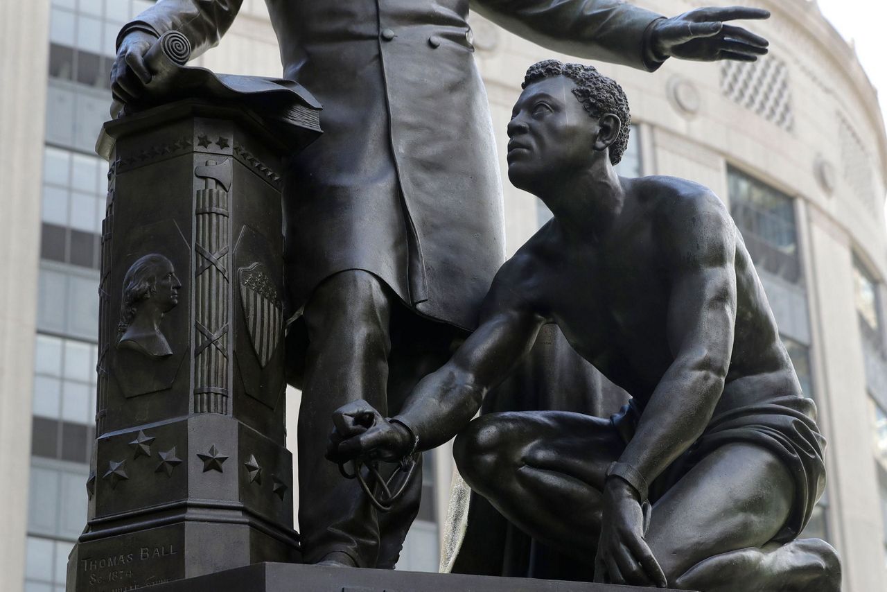 Protesters: Remove statues of slave kneeling before Lincoln