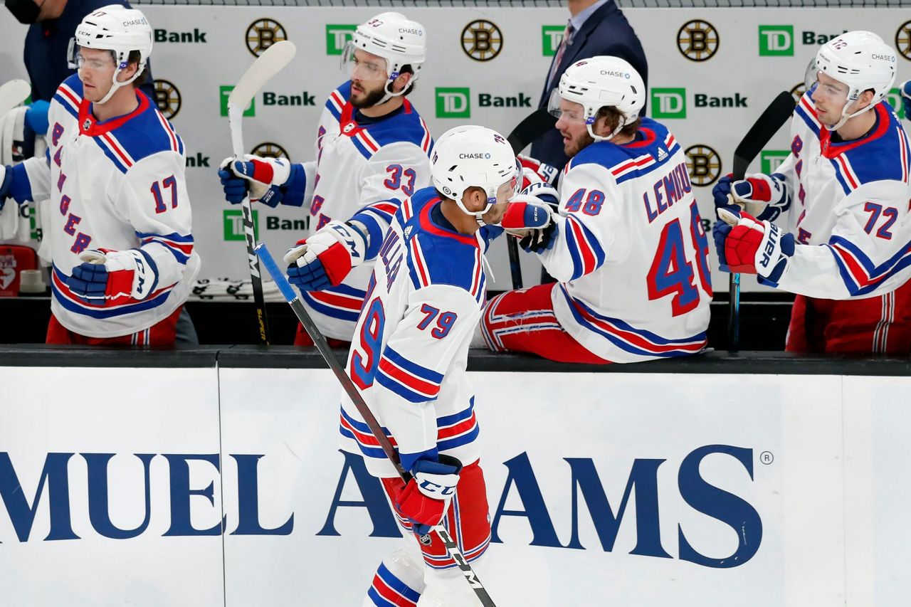 The Latest: Oklahoma's Harmon out for 2 rounds at NCAAs