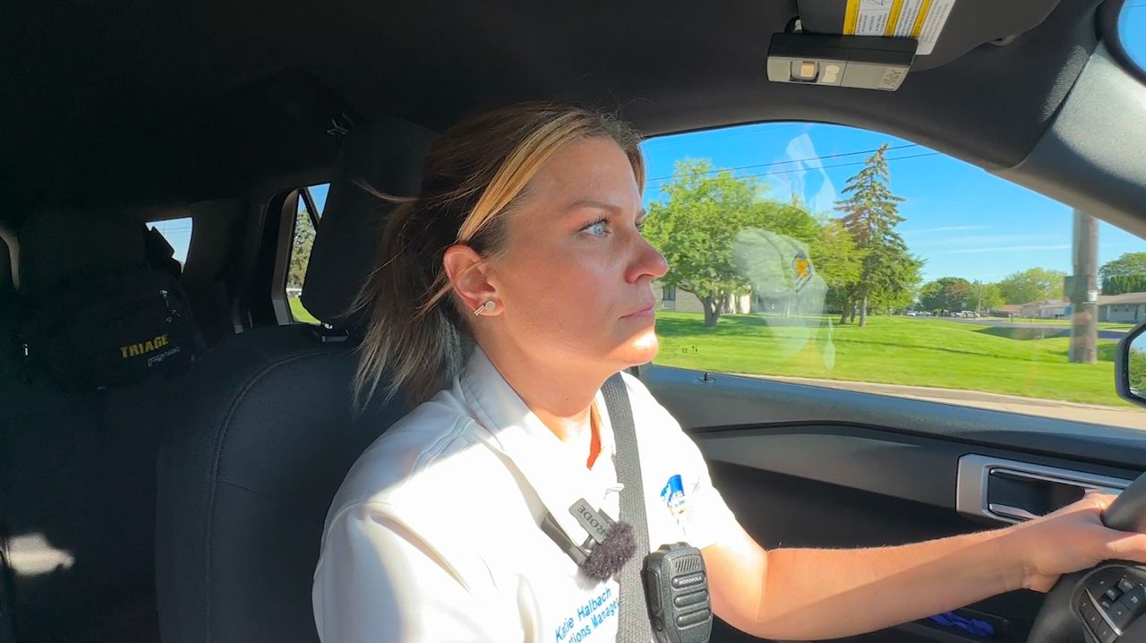 Gold Cross rapid response vehicle helping ambulance crews