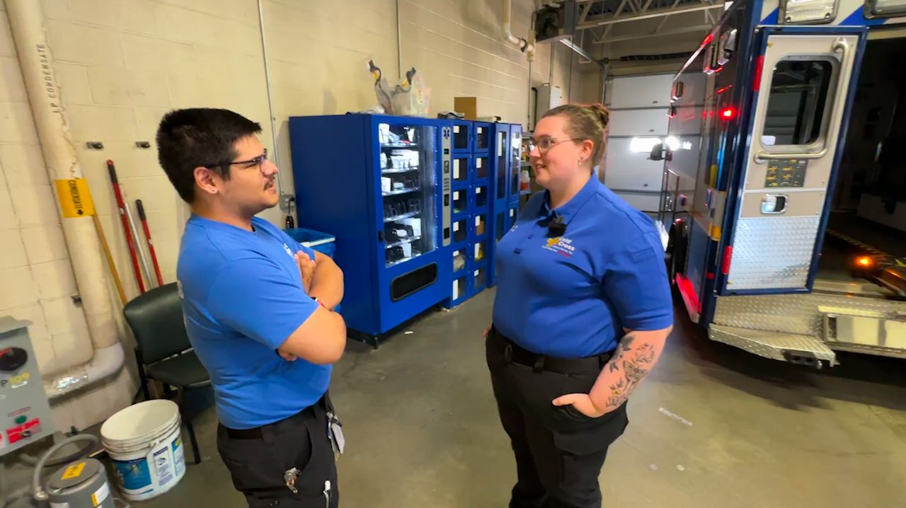 Gold Cross rapid response vehicle helping ambulance crews