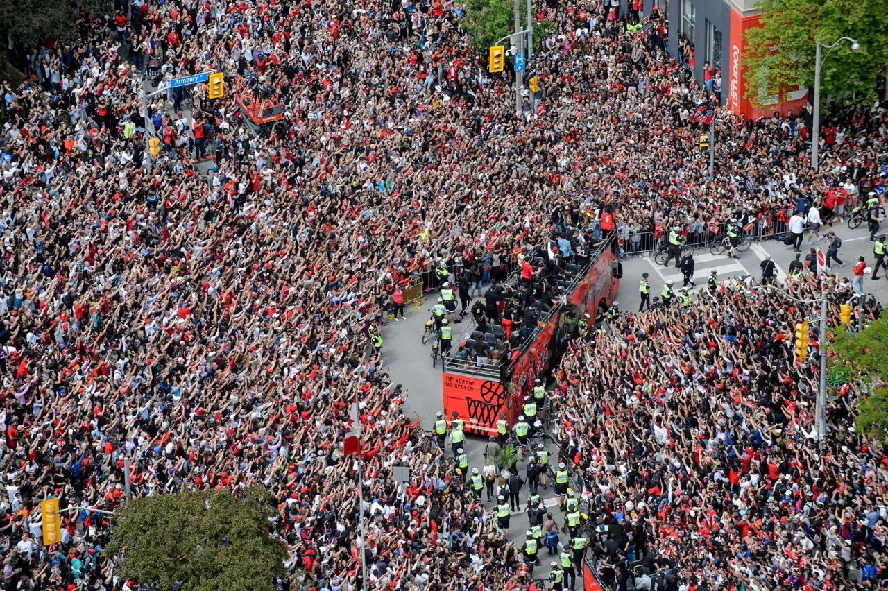 Huge crowds pack downtown Toronto for Raptors parade