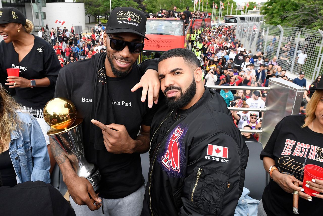 Huge crowds pack downtown Toronto for Raptors parade