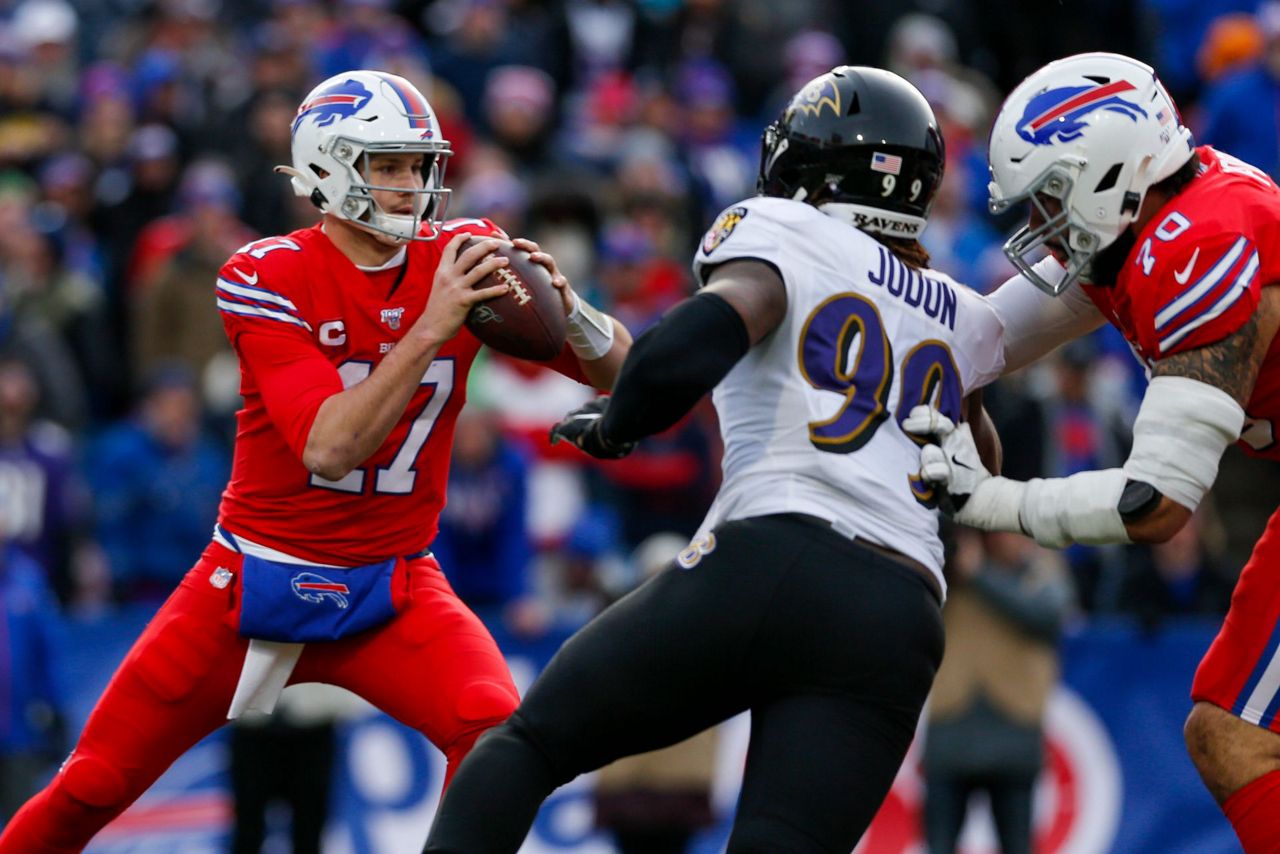 Ravens clinch AFC playoff berth with 24-17 win over Bills