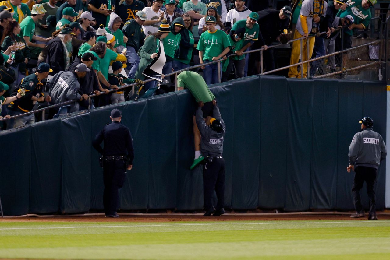 A's fans come out en masse for reverse boycott and tell owner John ...